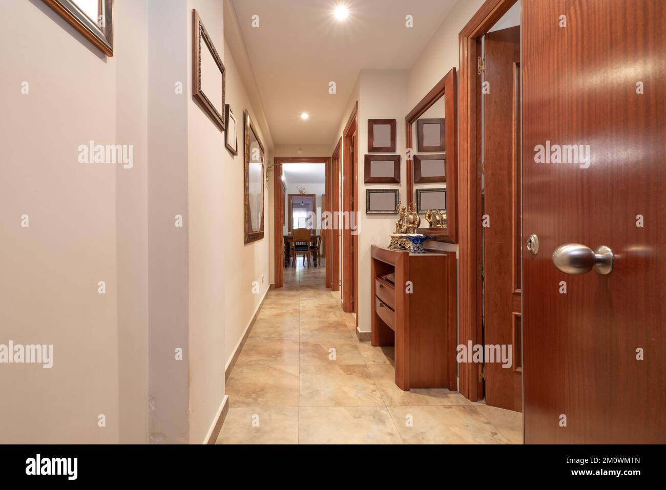 Entrance hall of a house with an armored access door, a long corridor ...