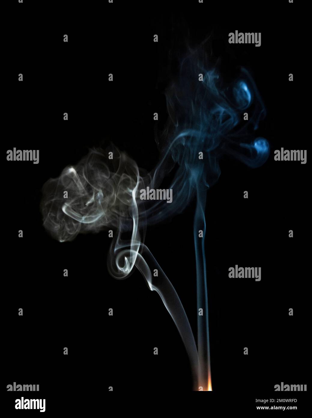Curling smoke forms shapes of dating man and woman Stock Photo - Alamy