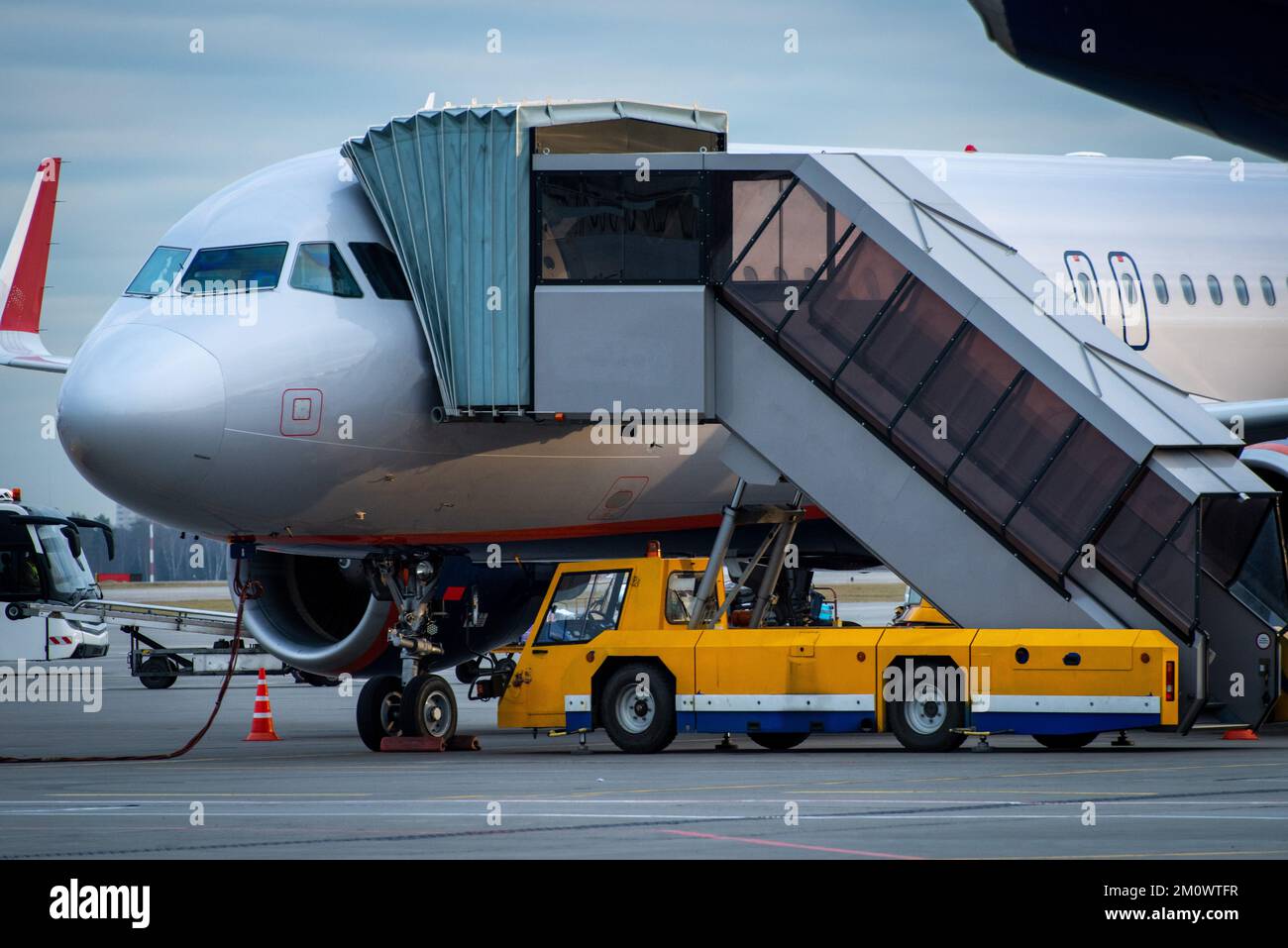 Passenger ramp at a modern passenger plane at an international airport ...