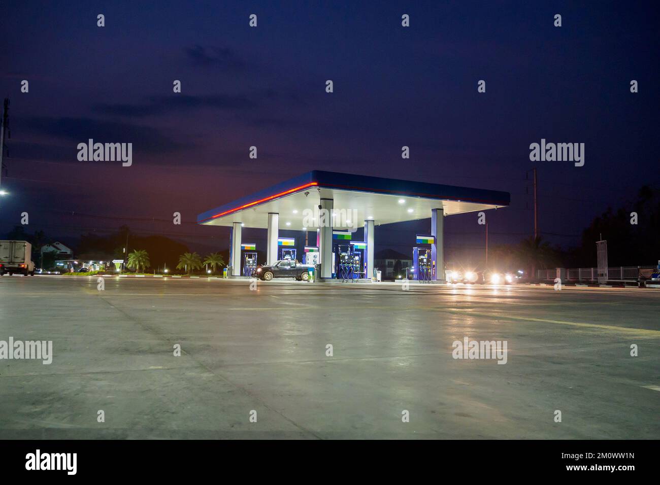 gas station with clouds and sky at sunset Stock Photo - Alamy