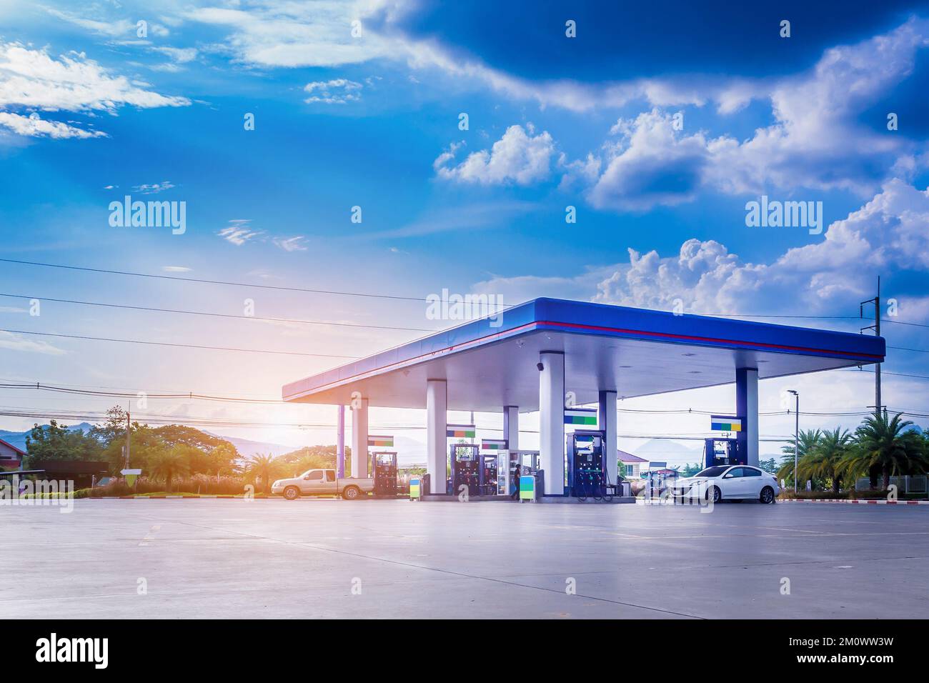 Gas fuel station with clouds and blue sky Stock Photo - Alamy