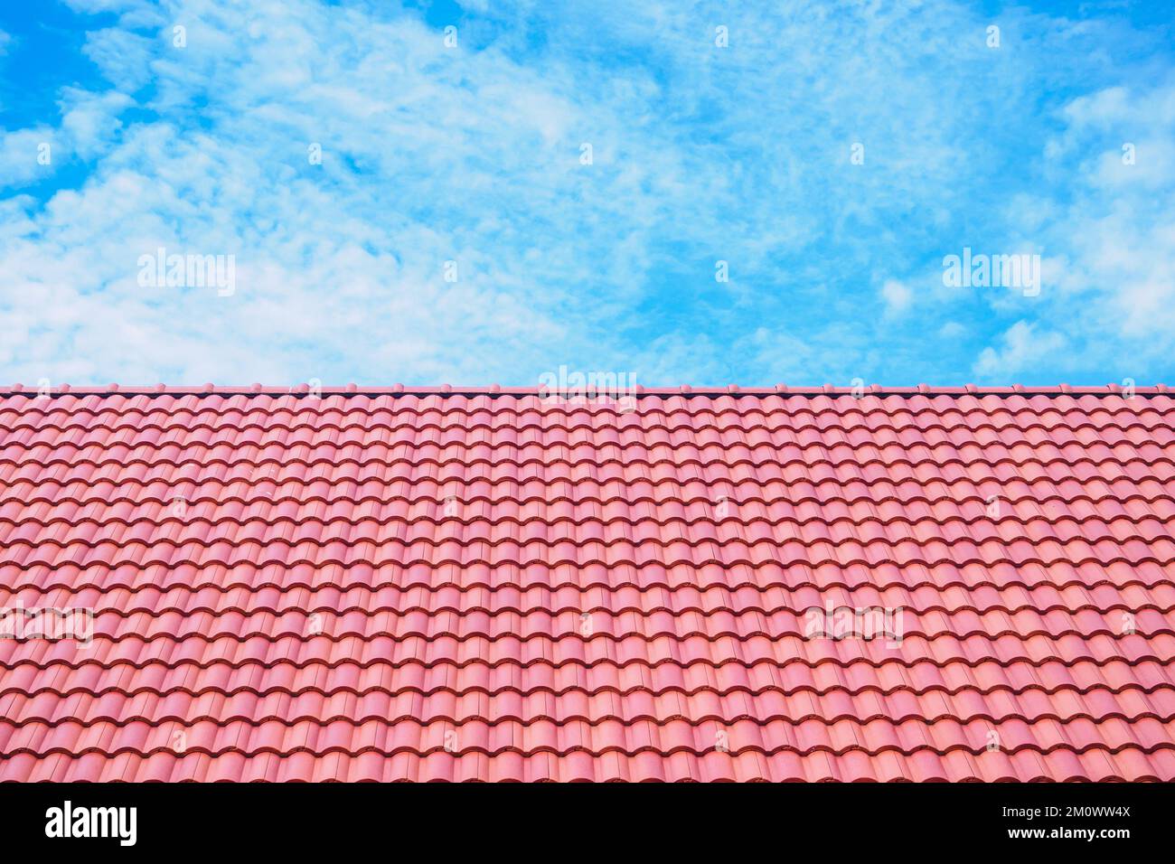 roof tiles patterns with blue sky and clouds Stock Photo - Alamy