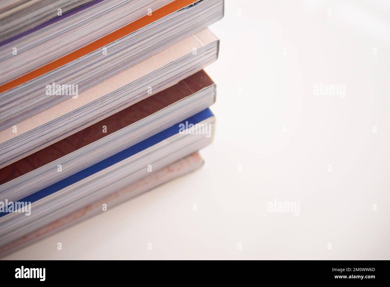 pile of magazines stack on white table in living room, close up Stock ...