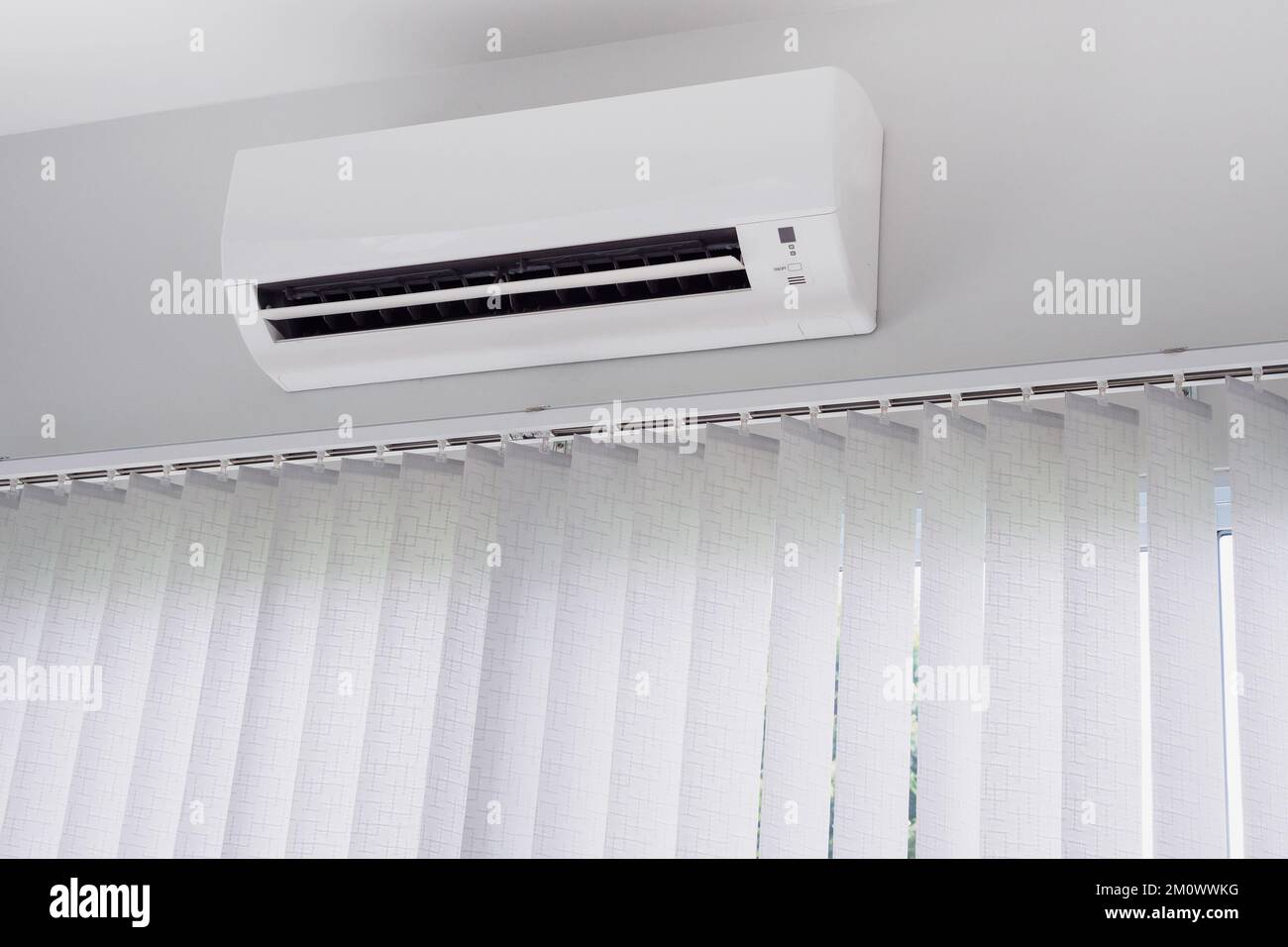 Air conditioner on white wall background Stock Photo - Alamy
