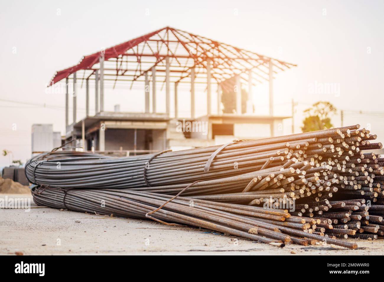 steel rebar for reinforcement concrete at construction site with house ...