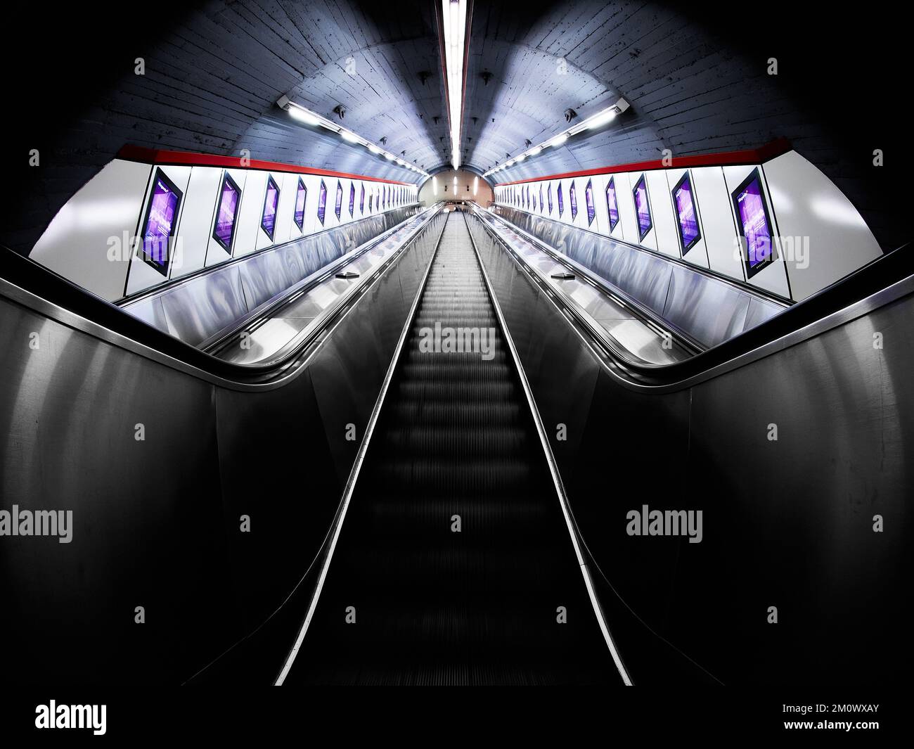 A modern escalator path with illuminated lights Stock Photo - Alamy