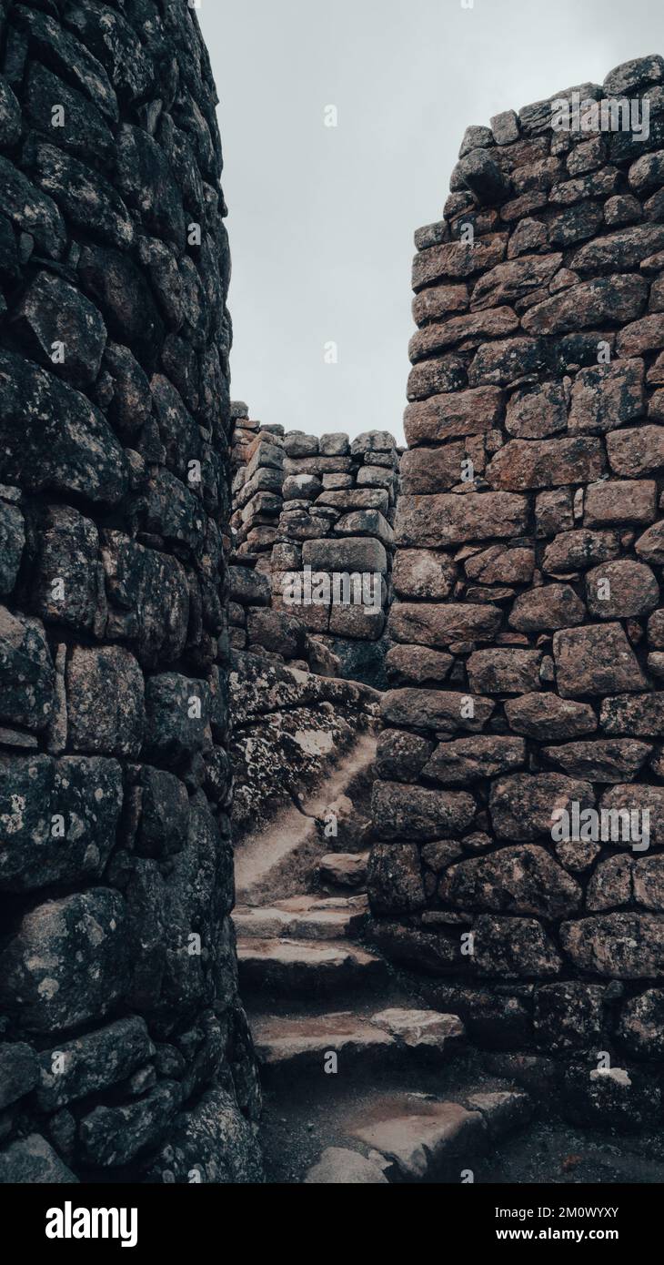 A vertical shot of historical pieces of architecture of Khami ruins ...