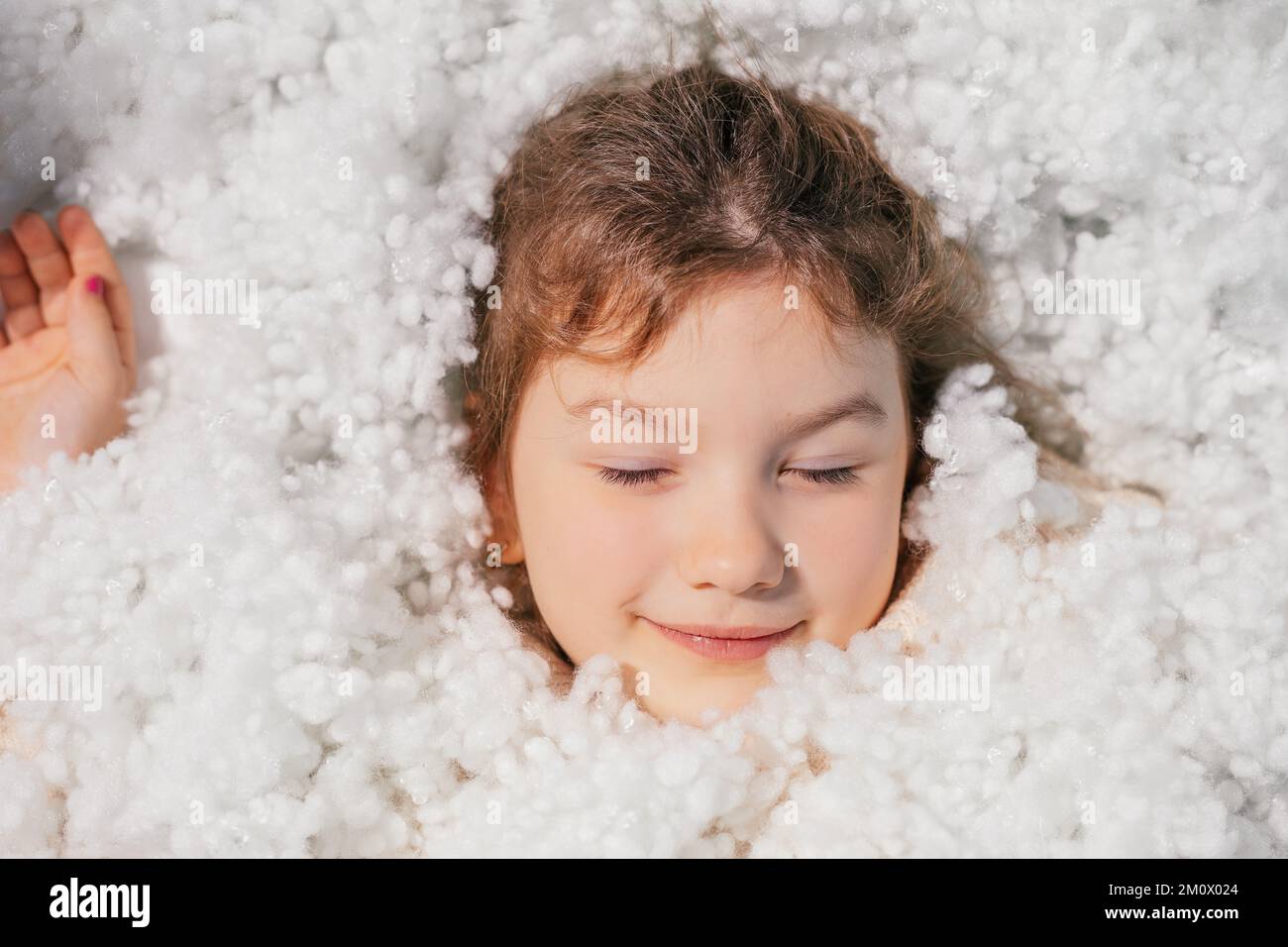 Close up serene cheerful calm, smiling girl face with close eyes in ...