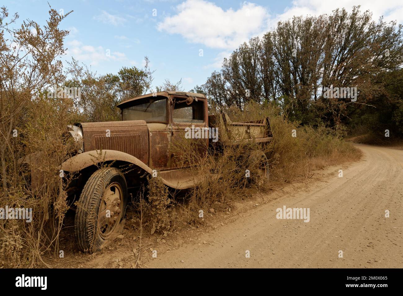 Abandonded Truck on And Old Dirt Road Stock Photo - Alamy