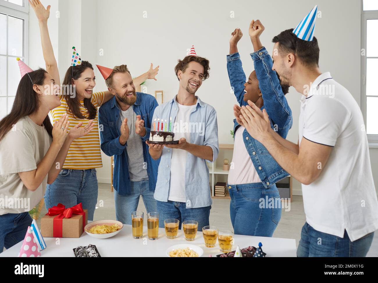 Group of happy, cheerful, excited people having fun at a birthday party ...