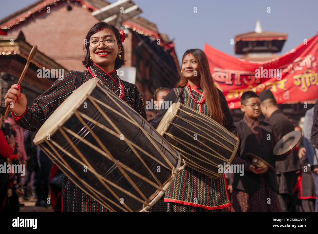 People from the Newar community dressed in traditional attires are seen ...