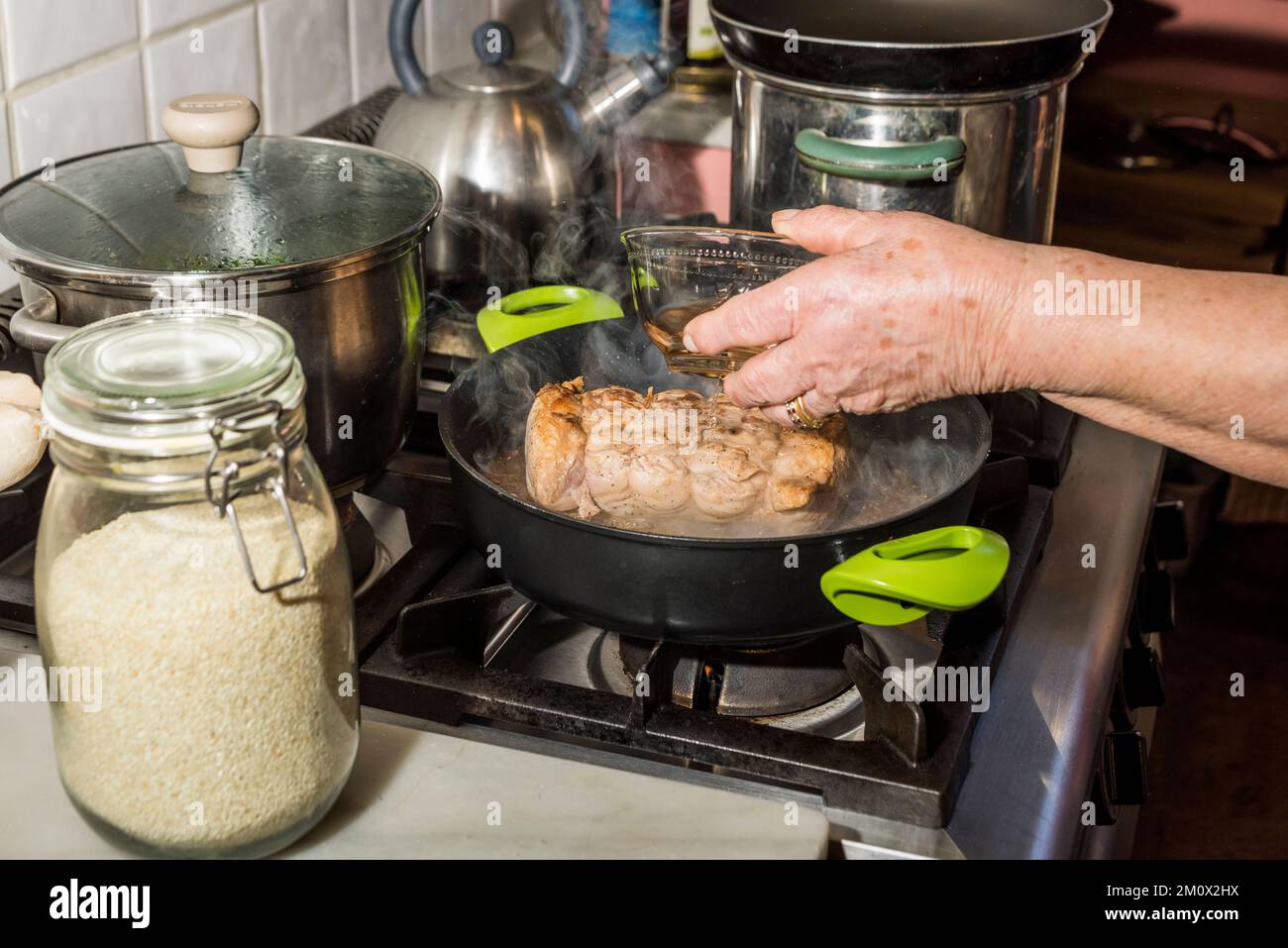 Older woman italy cooking hi-res stock photography and images - Alamy