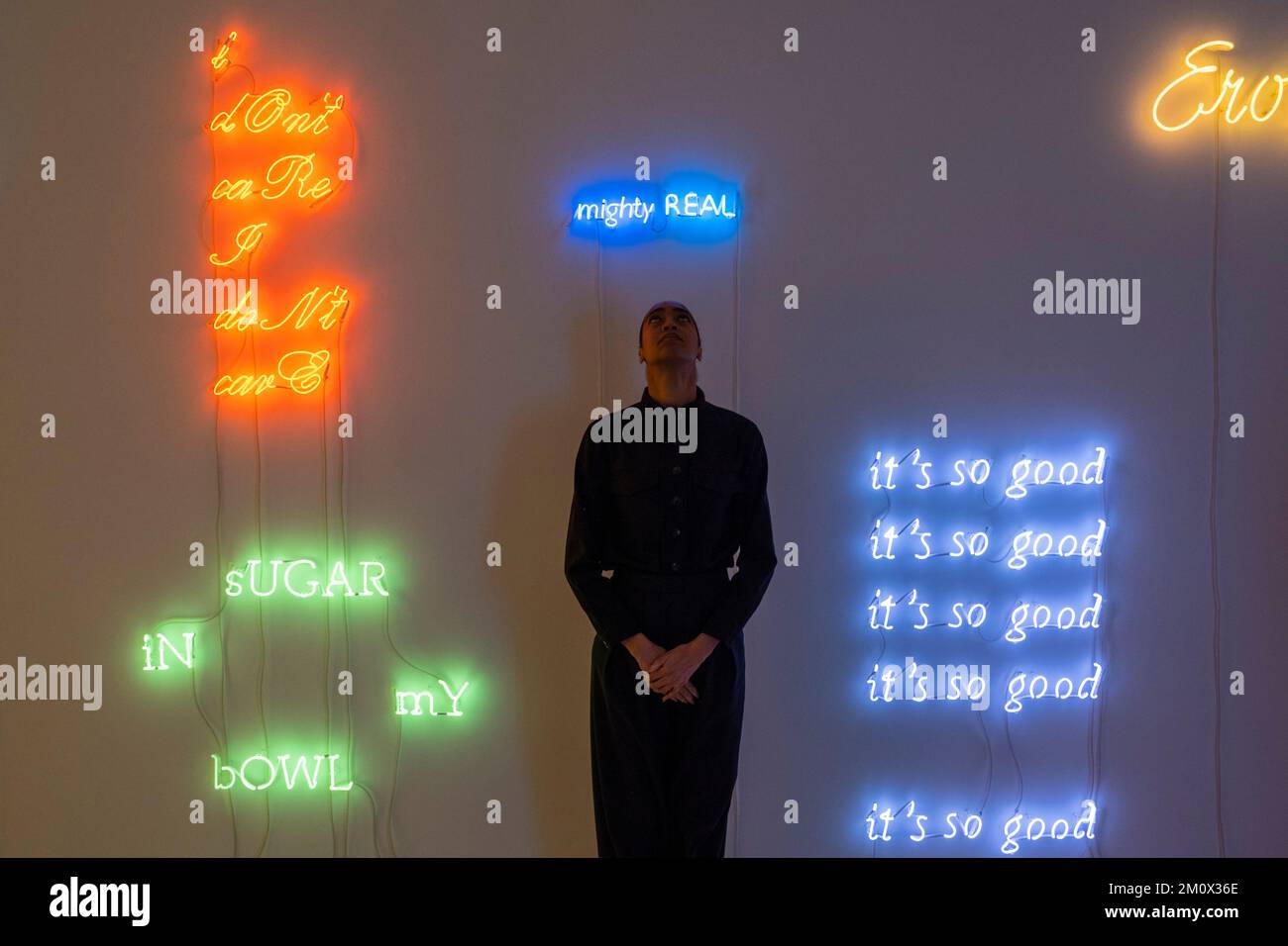 London, UK. 8 December 2022. A staff member views exhibits at a preview ...
