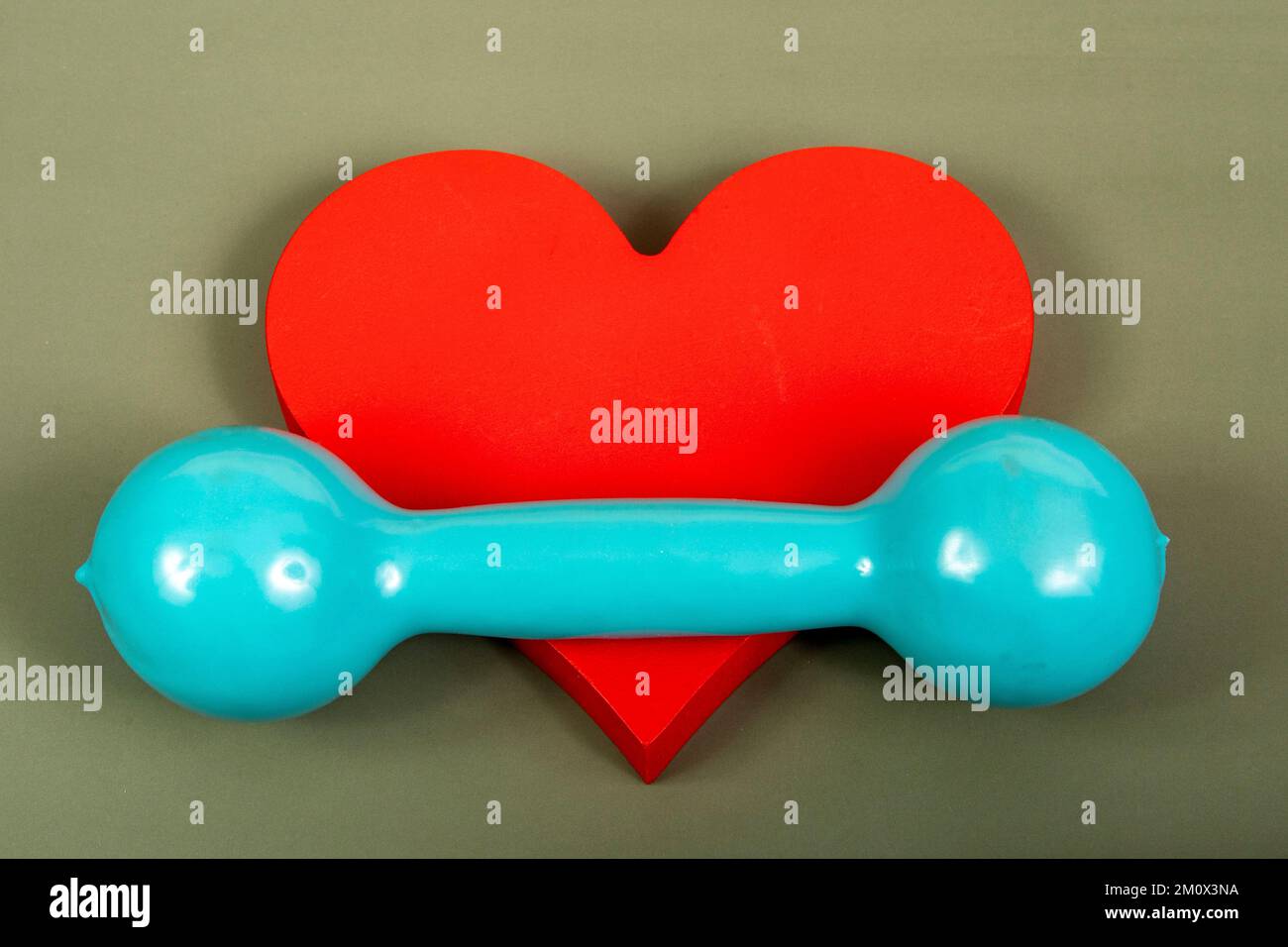 heart-related physical activity risks represented by a dumbbell weight ...