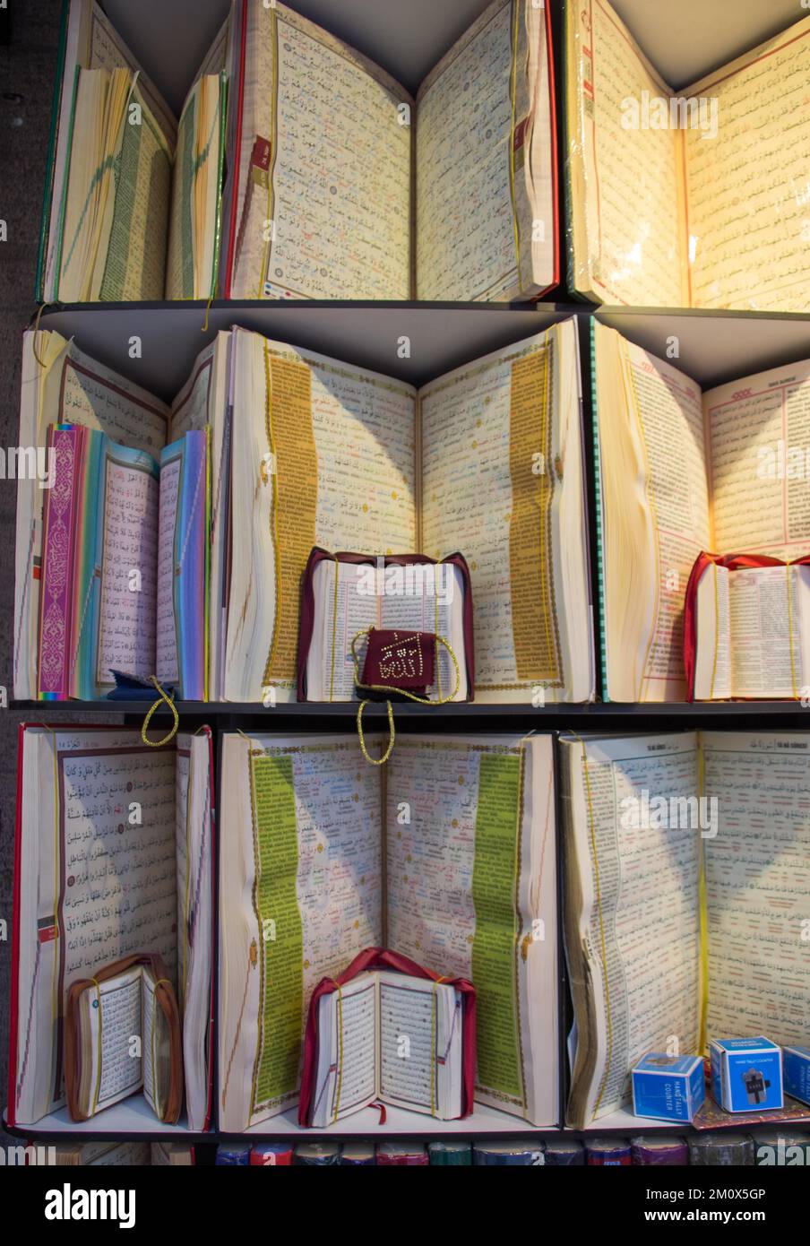 Islamic Holy Book Quran on the market shelf Stock Photo - Alamy