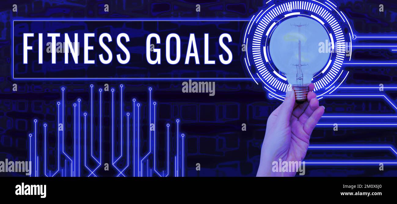 Hand writing sign Fitness Goals. Business overview Loose fat Build ...