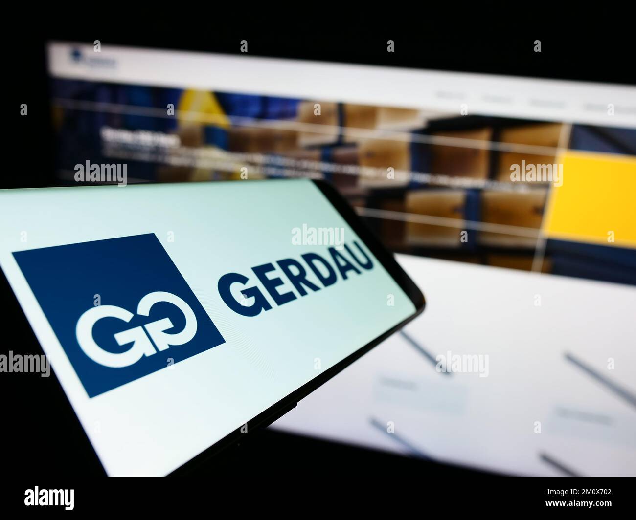 Smartphone with logo of Brazilian steel company Gerdau S.A. on screen ...
