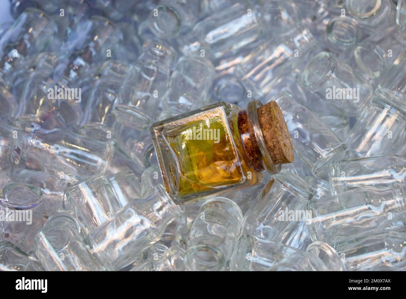 Set of Empty small transparent bottles in a box Stock Photo - Alamy