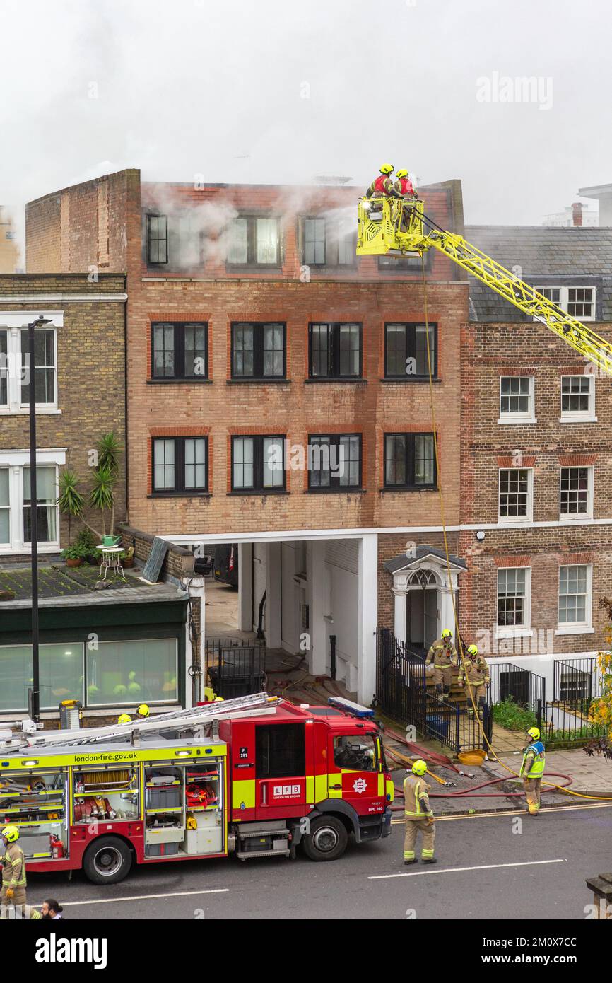 Fire Brigade attend to a fire in a residential building Stock Photo - Alamy