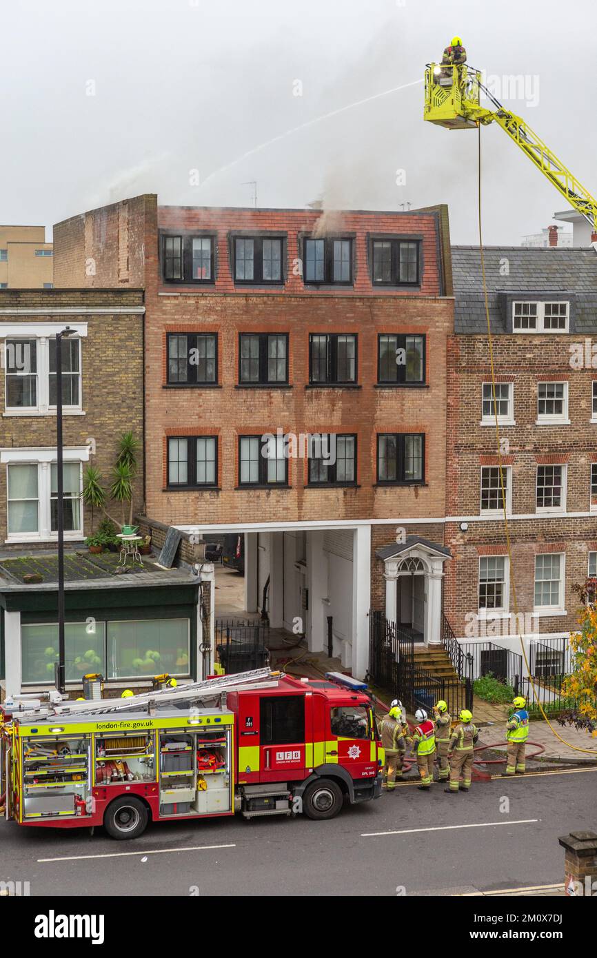 Fire Brigade attend to a fire in a residential building Stock Photo - Alamy