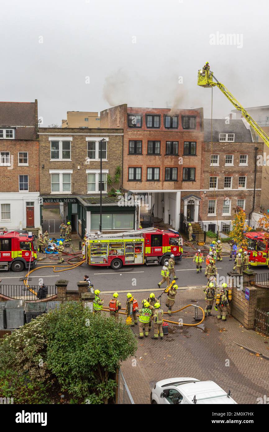 Fire Brigade attend to a fire in a residential building Stock Photo - Alamy