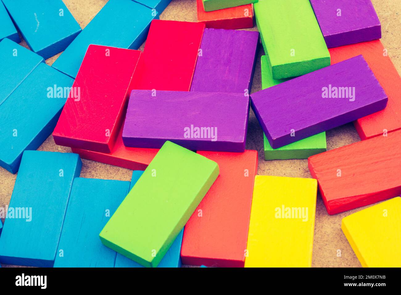 Wooden blocks of various color randomly scattered Stock Photo - Alamy