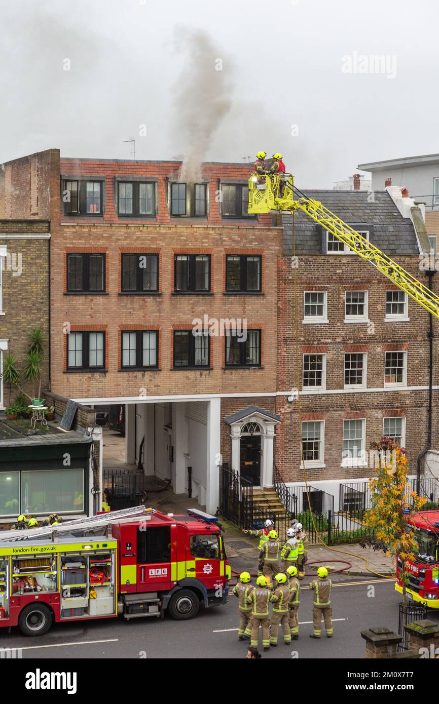 Fire Brigade attend to a fire in a residential building Stock Photo - Alamy