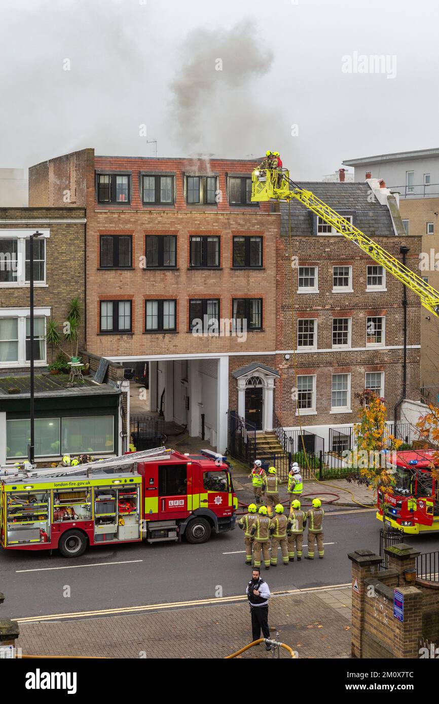 Fire Brigade attend to a fire in a residential building Stock Photo - Alamy