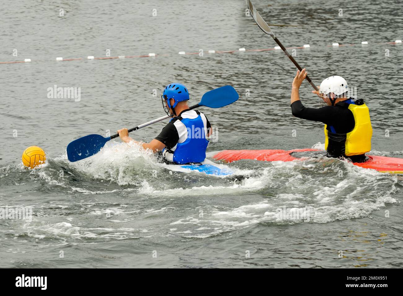 People are playing kayak polo Stock Photo - Alamy