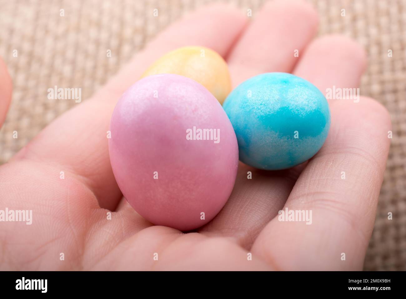 Candy in hand hi-res stock photography and images - Alamy