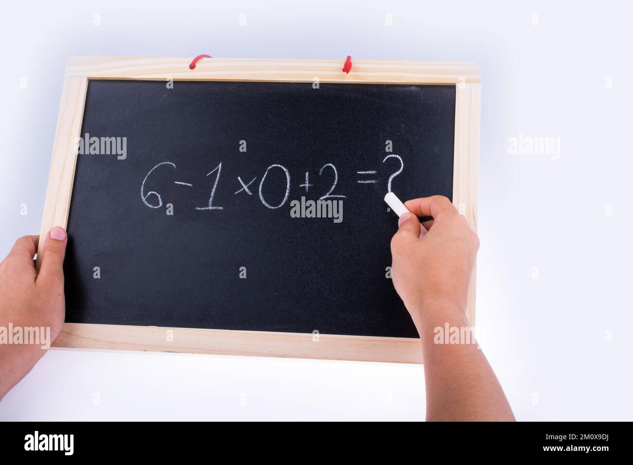 Hand writing a math problem on board with a chalk Stock Photo - Alamy