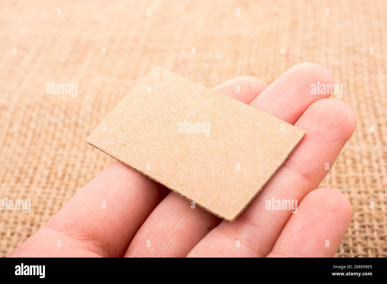 Little note paper on a linen canvas Stock Photo - Alamy