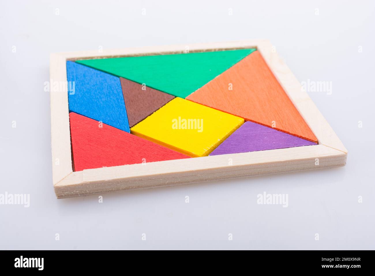 Colorful pieces of a square tangram puzzle Stock Photo - Alamy