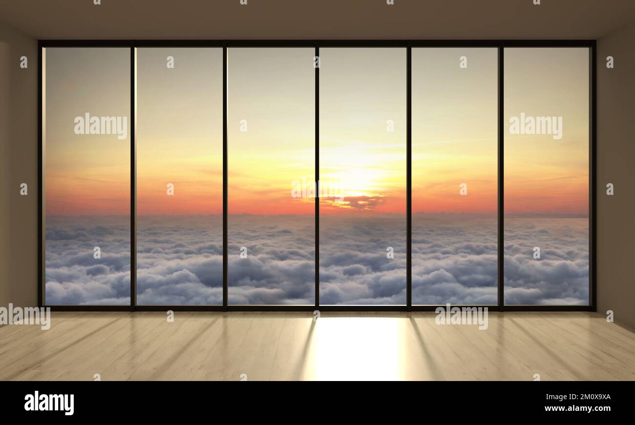 View through panoramic window sunset and clouds Stock Photo - Alamy