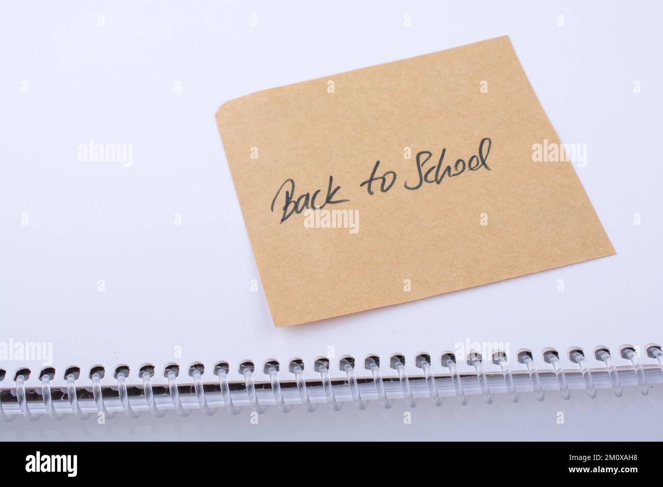 Notebook and back to school title on a notebook Stock Photo - Alamy