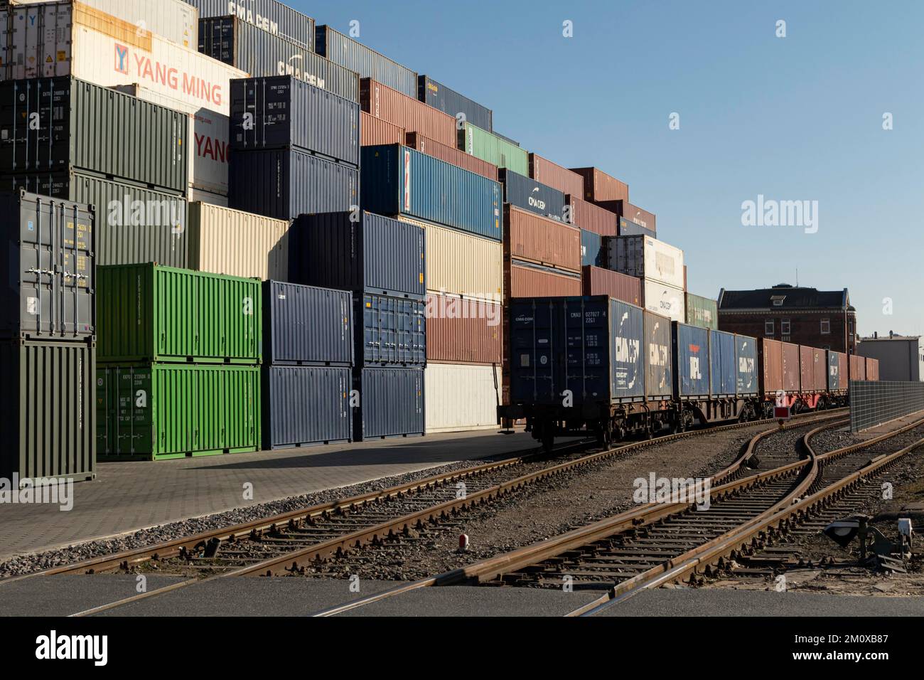 Symbolic image Logistics, containers and freight wagons on rails in the ...
