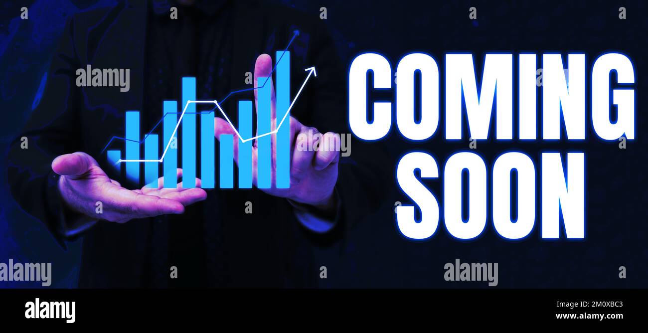 Hand writing sign Coming Soon. Business overview something is going to ...