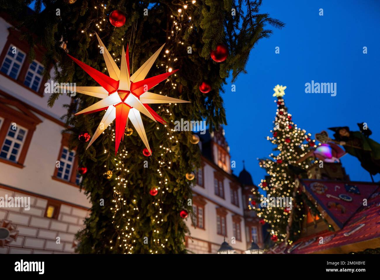 Christmas market lights in a town square as Advent begins. Coburg ...