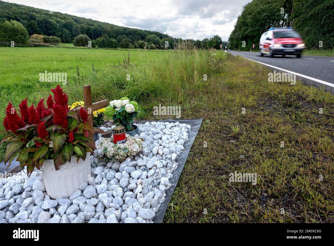 Memorial with cross for victims of road accident on country road ...