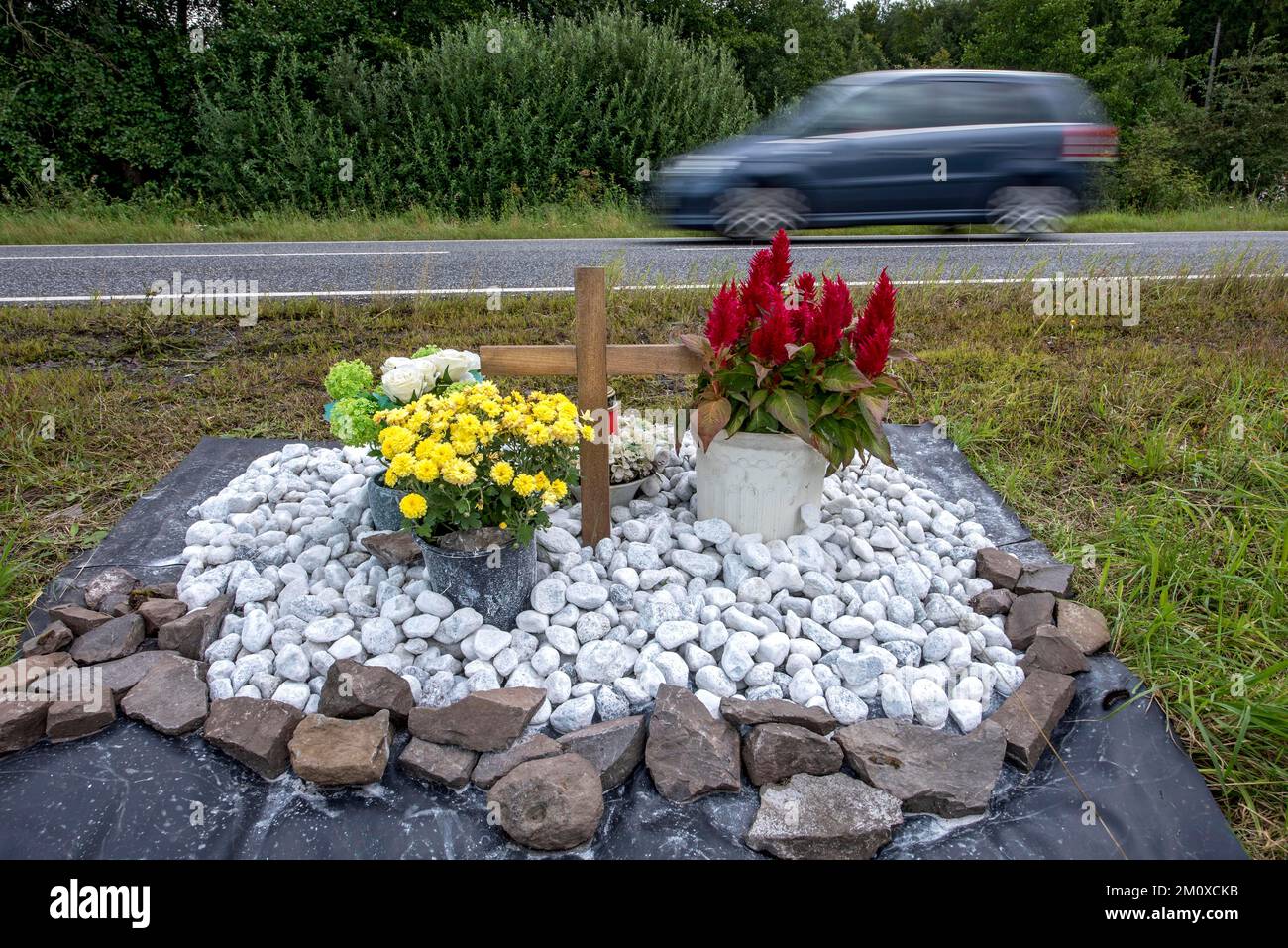 Memorial with cross for victims of road accident on country road ...