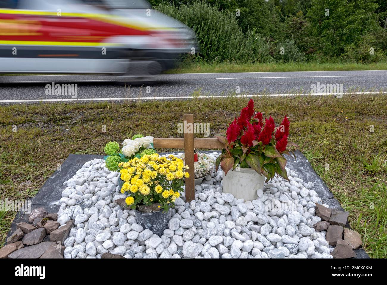 Memorial with cross for victims of road accident on country road ...