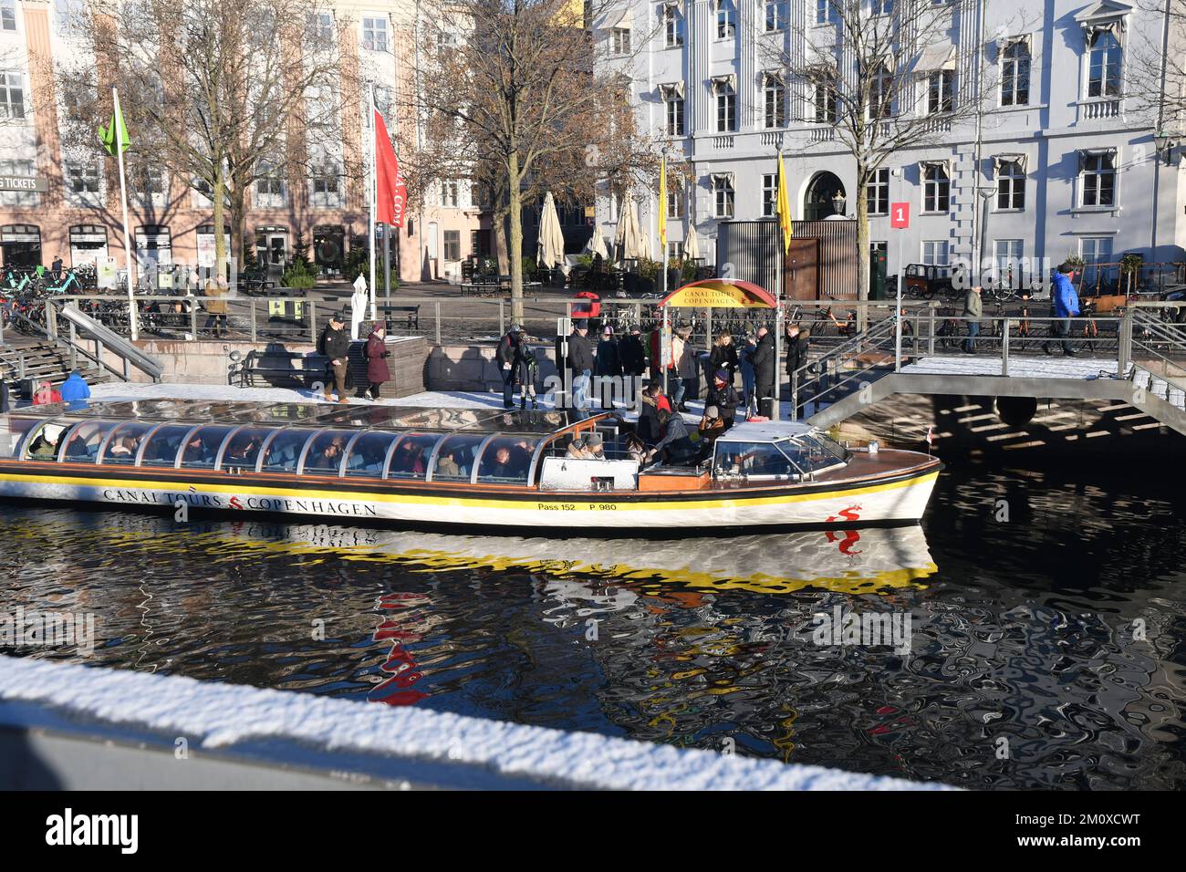Copenhagen/Denmark/08 December 2022/ Winter tourists boarding on Canal ...