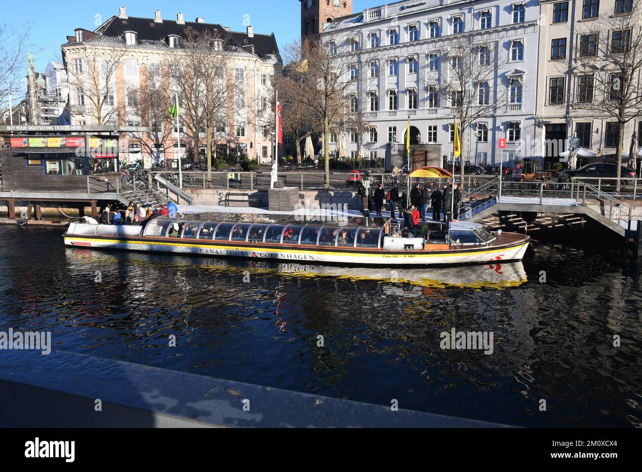 Copenhagen/Denmark/08 December 2022/ Winter tourists boarding on Canal ...