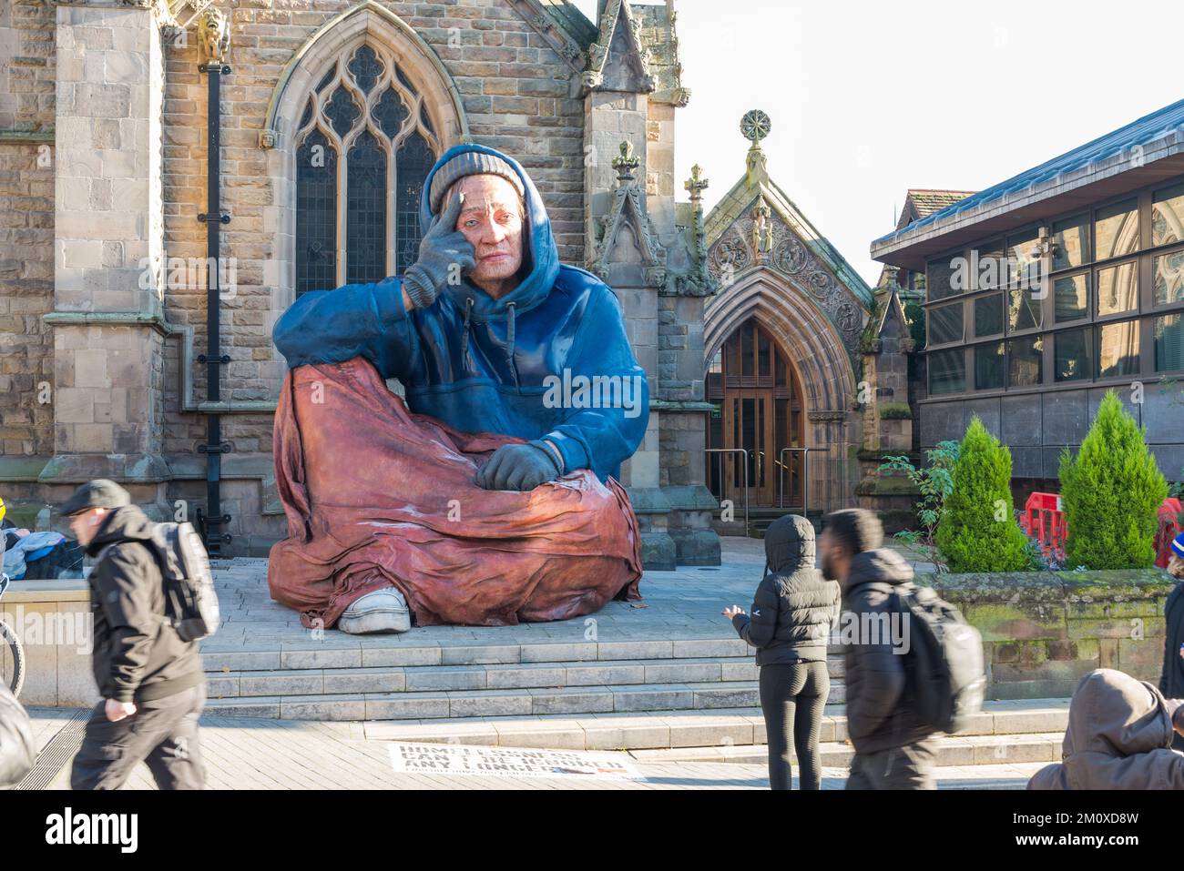 Large statue of homeless person outside St Martin's Church in the Bull ...