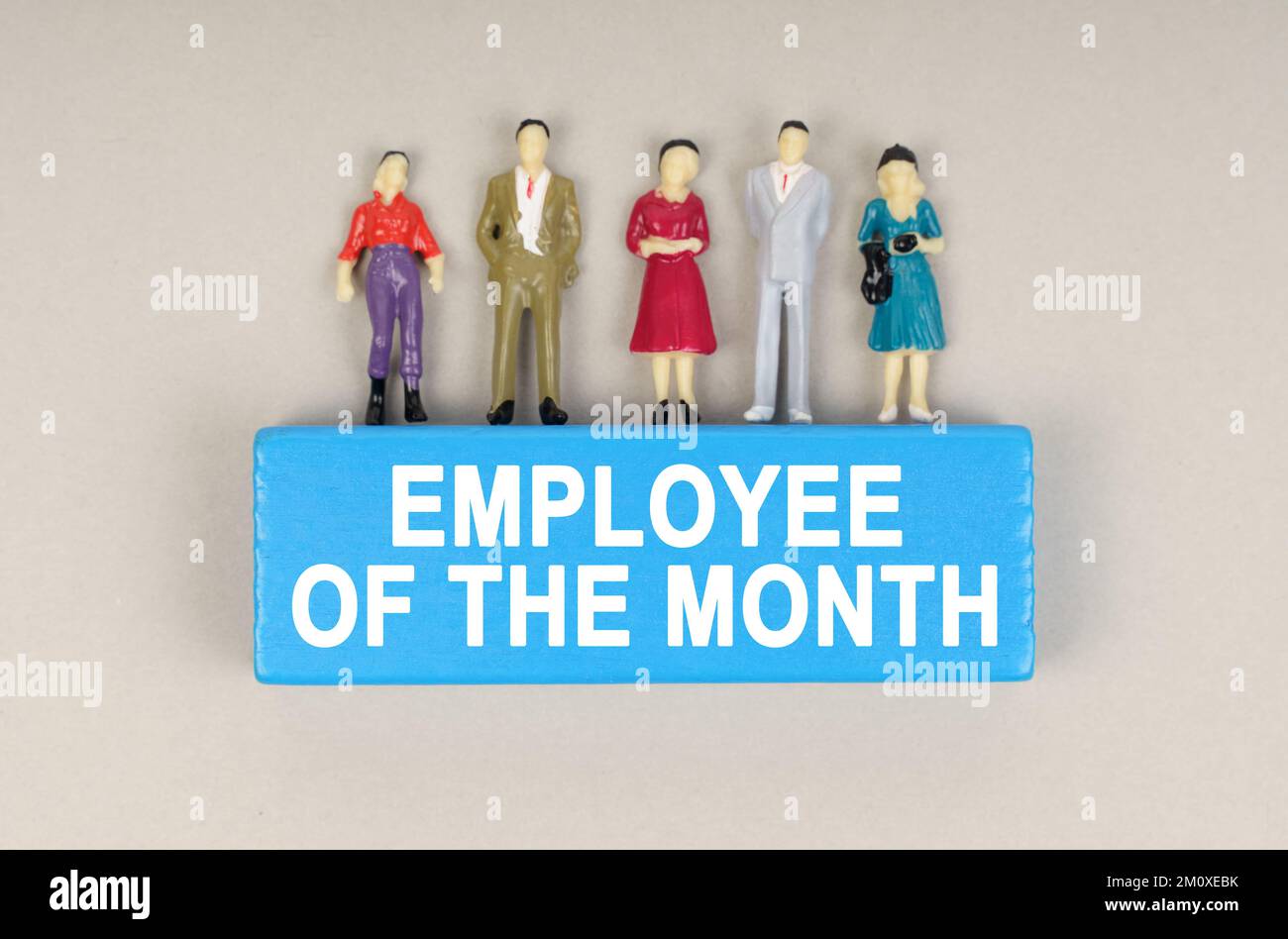 Business concept. On the blue block the inscription - Employee of the ...