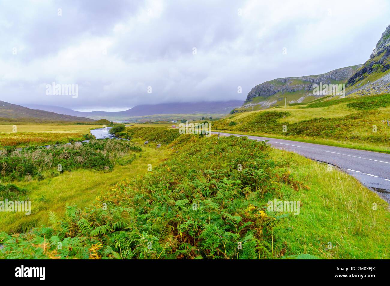 View of road and landscape along the NC500 route, in the Highlands ...