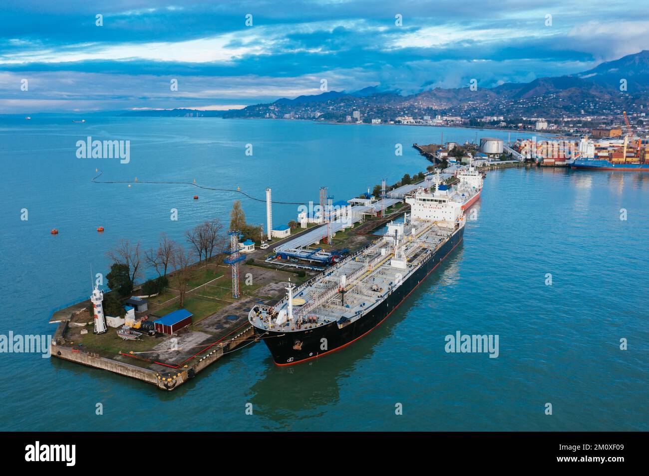 Ship tanker with LPG, oil or chemical production. Process of loading of ...