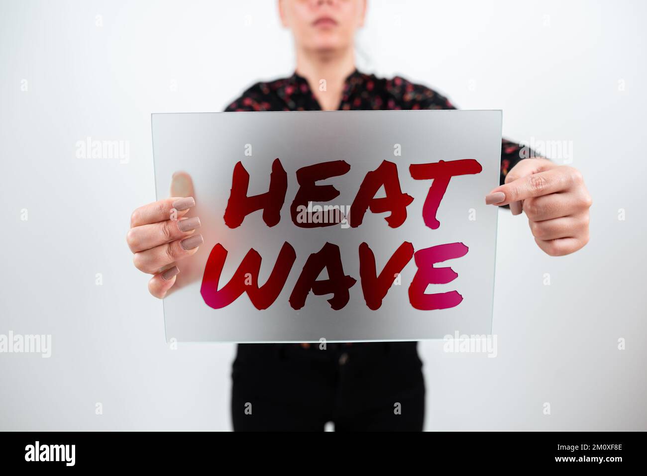 Writing displaying text Heat Wave. Word for a prolonged period of ...