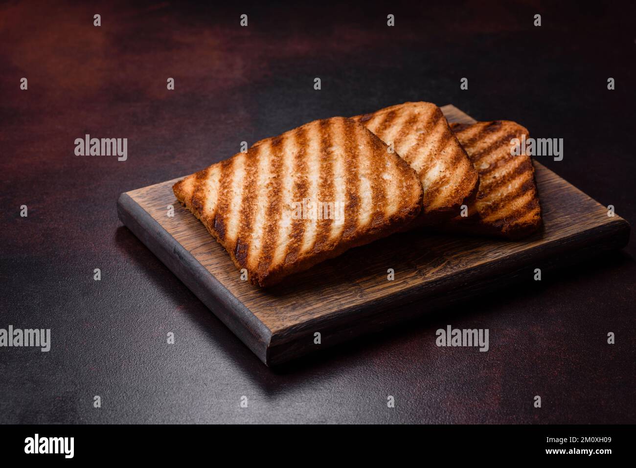 Tasty fresh crispy bread slices in the form of grilled toast for ...