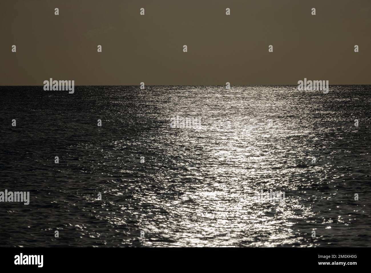 Beautiful view of reflection on ocean surface during sunset. Beautiful ...